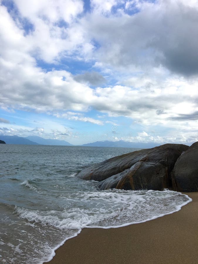 Rocks on the beach stock image. Image of summer, water - 193556405