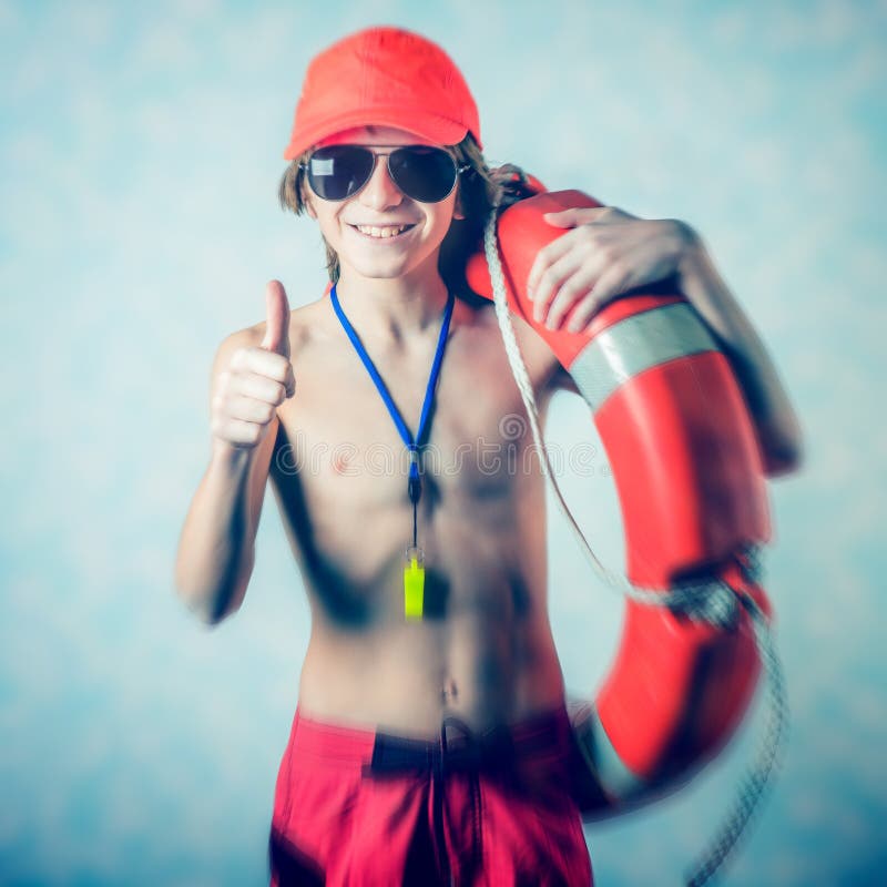 Beach lifeguard boy stock image. Image of holidays, shore - 59435107