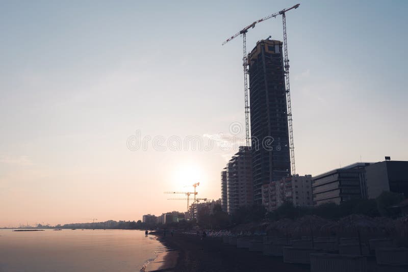 Beach in Limassol with High-rise Building Construction Site Stock Image ...