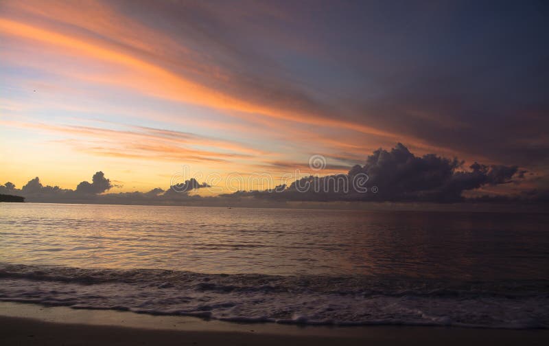 Beach line during sunrise. stock image. Image of sunrise - 86574539