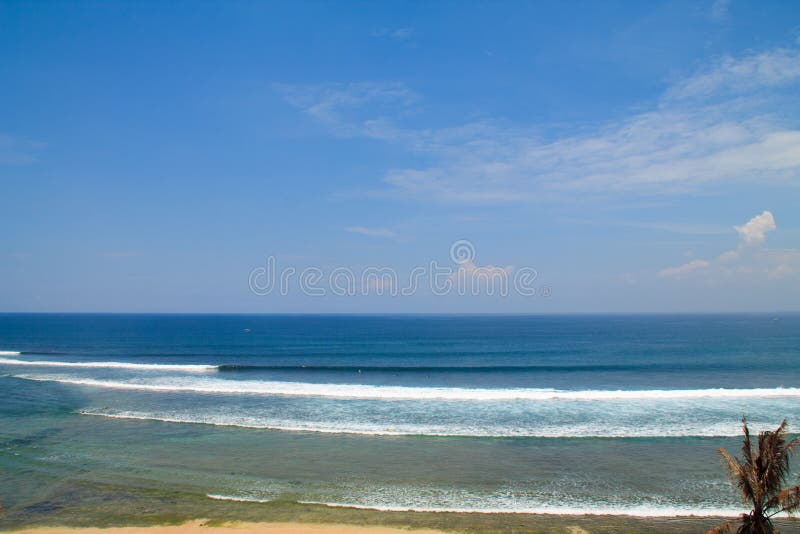 Beach and long waves stock photo. Image of blue, surf - 53098920