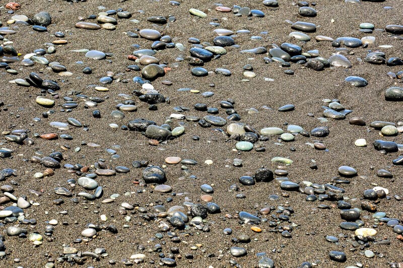 A Beach with a Lot of Rocks on it Stock Photo - Image of stone ...