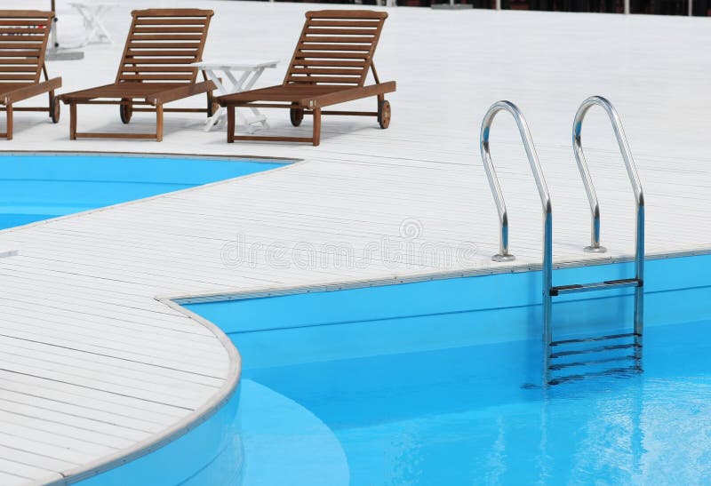 Beach Lounge Chair Near the Pool Stock Image - Image of furniture, rest ...