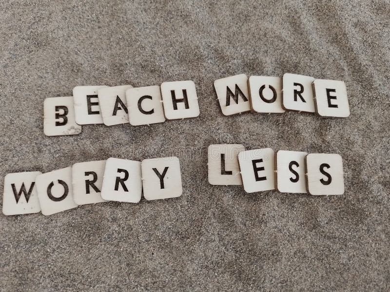 Beach More Worry less Message on Wood Blocks on Sand at the Beach Stock ...