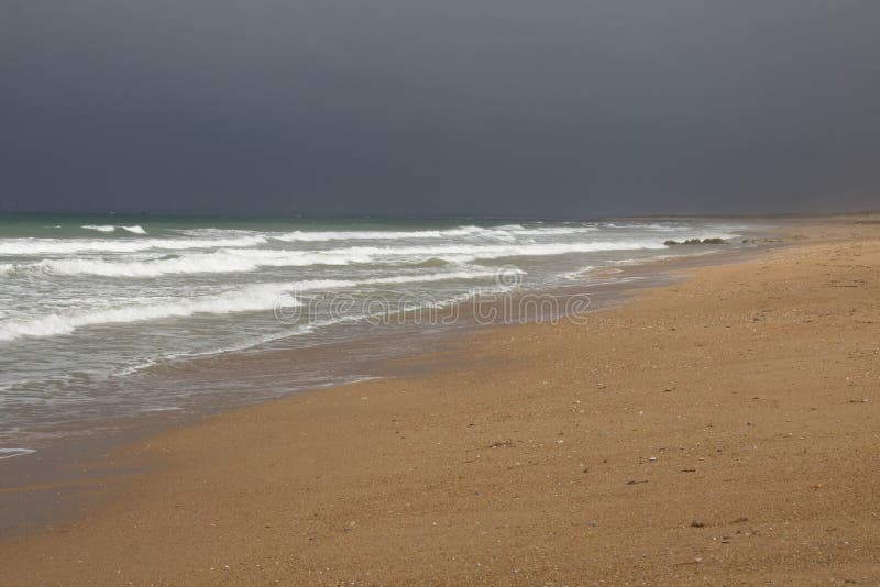 Beach in the morning stock image. Image of sunlight - 258855857