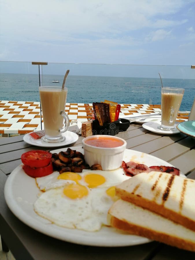 Beach morning breakfast stock image. Image of delicious - 170096987