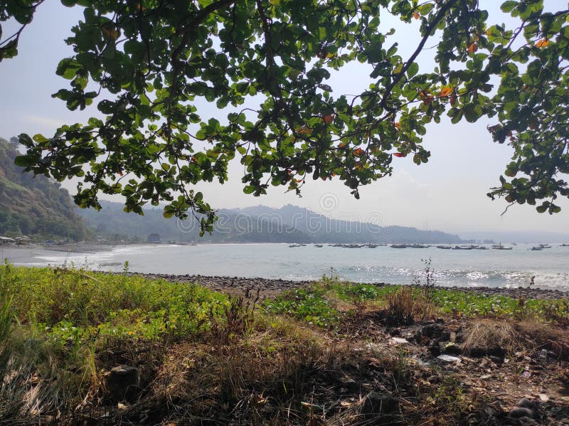 Beach and mount stock image. Image of stone, java, beach - 227184647