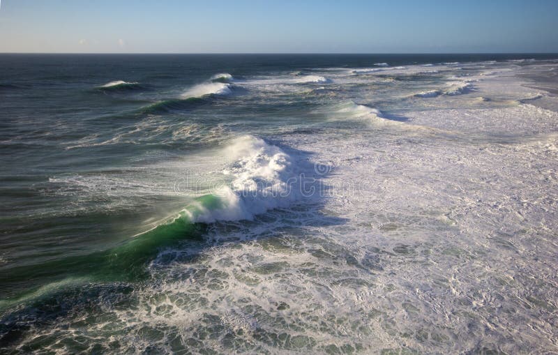 Beach in Nazare, Portugal stock image. Image of cliff - 376991519