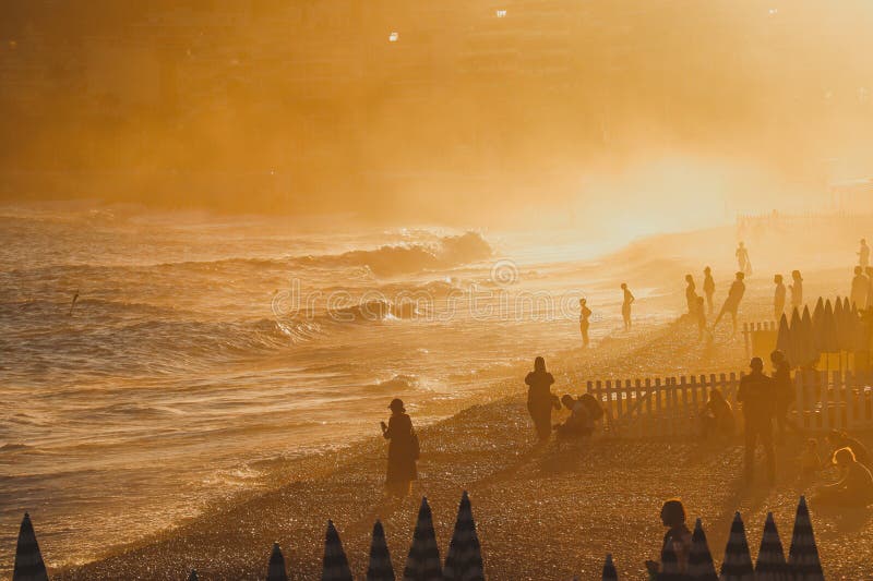 Beach in Nice with Big Waves in the Light of the Setting Sun Editorial ...