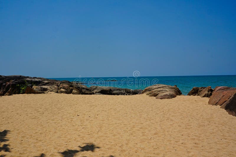 Beach with No People and Rocks Stock Image - Image of coastline, pool ...
