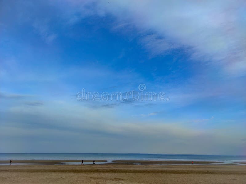 Beach in Normandy stock photo. Image of cloud, dawn - 217405180