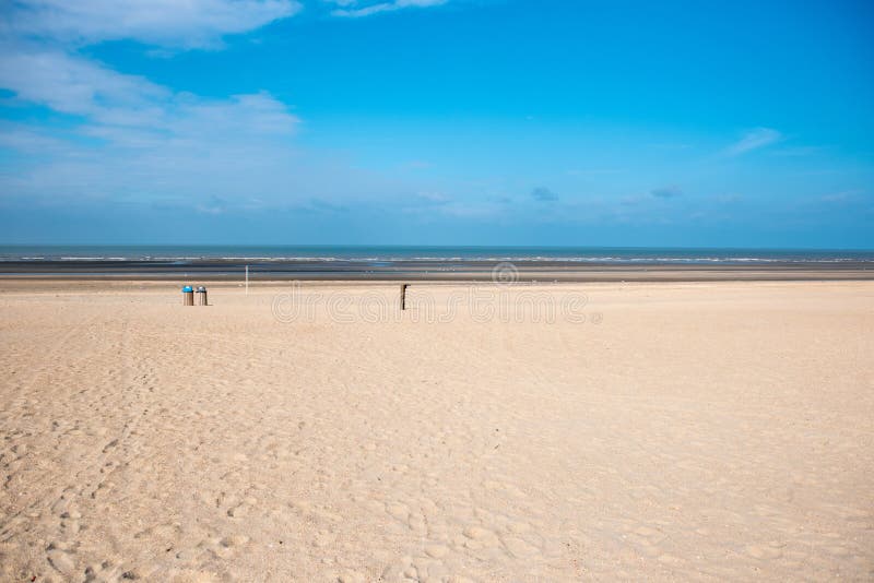 Beach of the North Sea in Koksijde, Belgium Under Blue Sky Stock Image ...