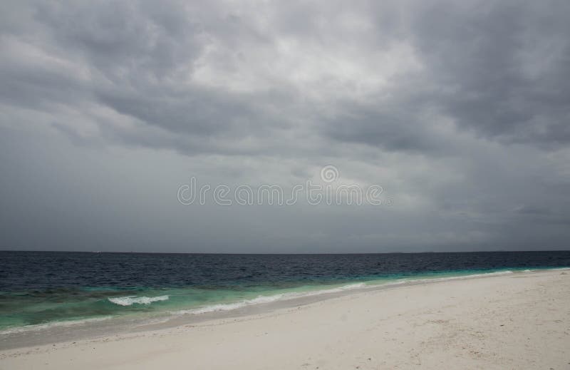 The Beach and Ocean on a Cloudy Day Stock Image - Image of water ...