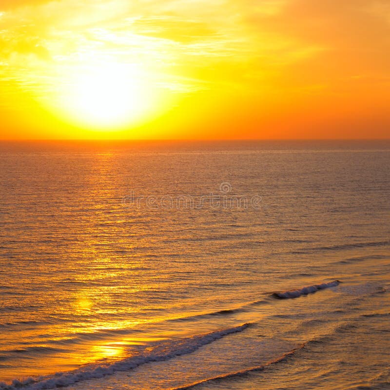 Bright sun rise over beach stock photo. Image of dawn - 104648072