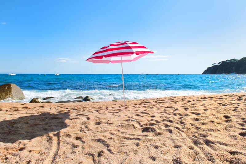 Striped Parasol On The Beach Stock Photo - Image of paradise, nature ...