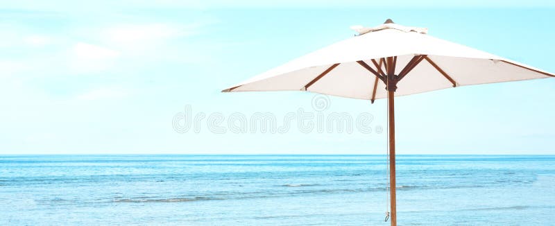 Beach Parasol on the sky stock photo. Image of seaside - 98570178