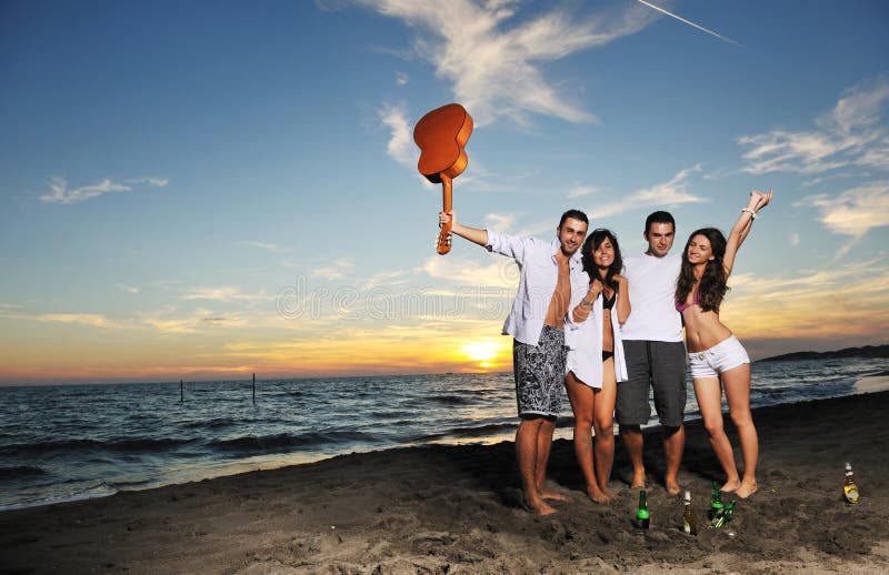 Young People Enjoying a Summer Beach Party, Dancing. Stock Image ...