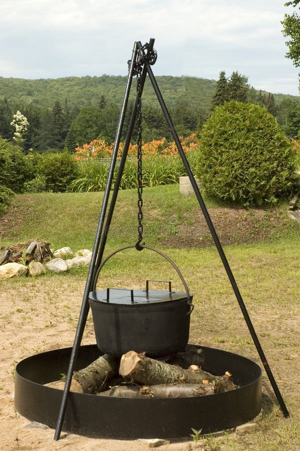 Beach party cooking pot stock image. Image of ground, iron - 973895