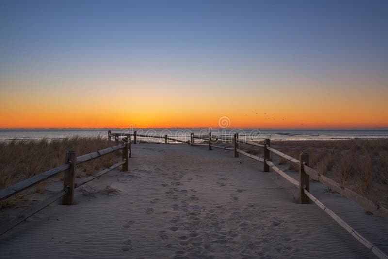 Beach Path Leading To the Ocean at Sunrise Stock Photo - Image of skies ...