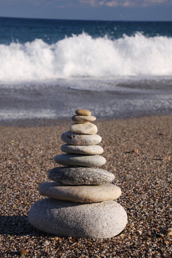Beach pebbles stock image. Image of wave, peaceful, cairn - 80089011