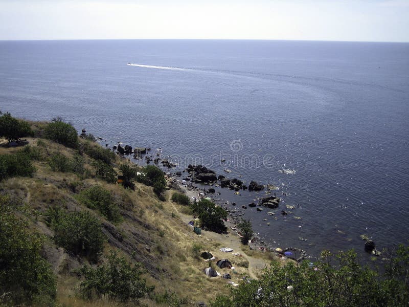 Beach and Piles of Stones in the Sea Near the Shore Stock Photo - Image ...