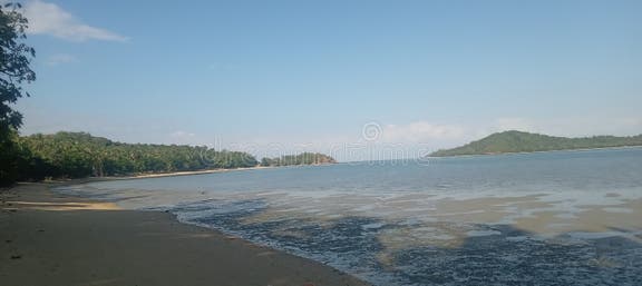 A Beach with Receding Sea Water Stock Photo - Image of receding ...