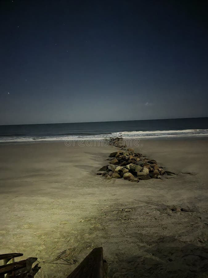 Beach Rock Dividers in Sand at Night Stock Image - Image of night, sand ...