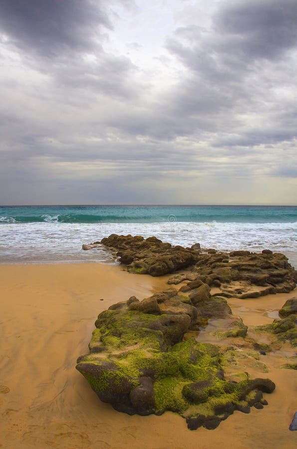 Beach and Rocks stock photo. Image of sand, waves, tones - 13161356