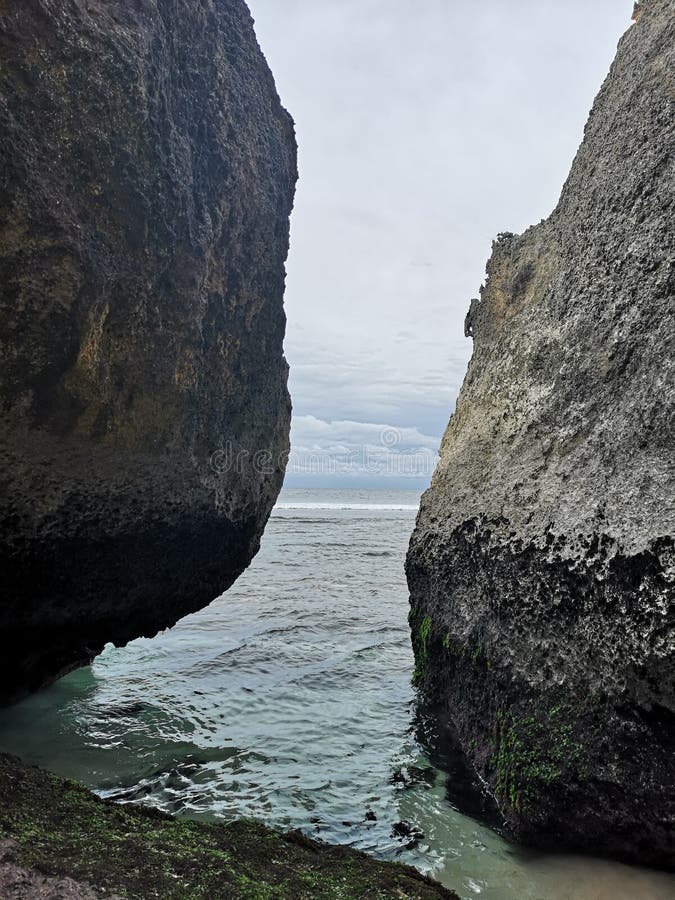 Beach between rocks stock image. Image of rock, shore - 203342923