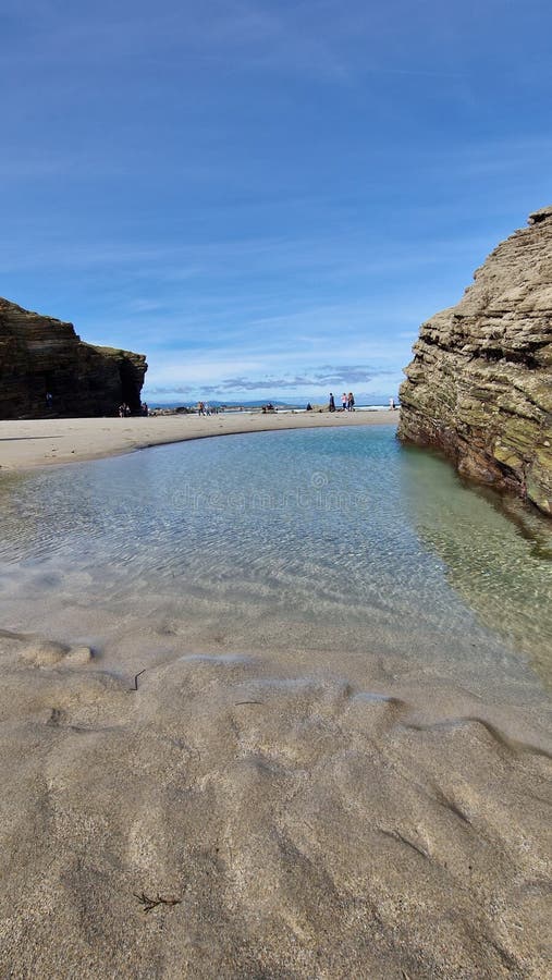 Beach and rocks stock photo. Image of geology, cliff - 265379924