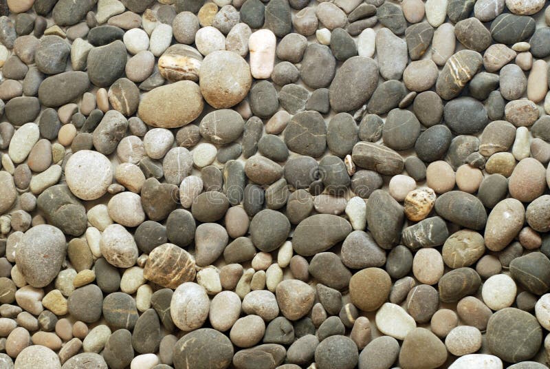 Round rocks on the beach stock image. Image of pebble - 14756771