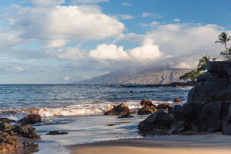 The Beach and Rocks in Maui Hawaii Stock Photo - Image of park ...
