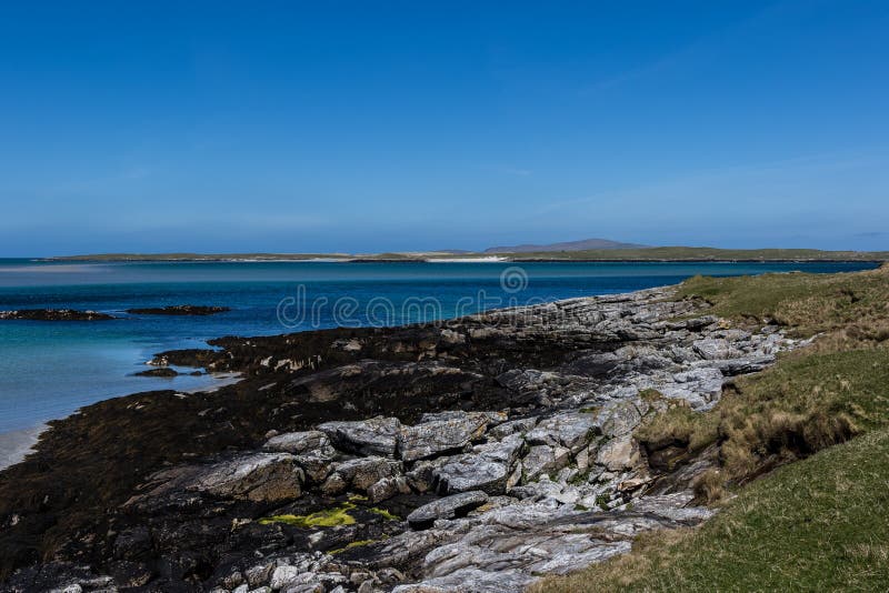 Beach with Rocks and White Sand in the Outer Hebrides, Scotland. Stock ...