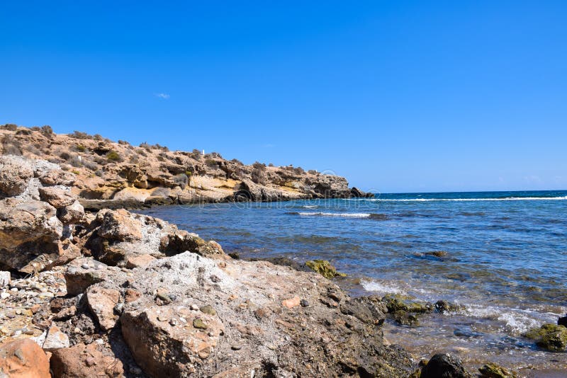 Beach and rocks stock photo. Image of heaven, water, large - 78825040