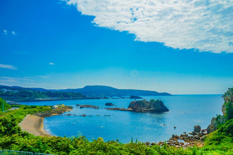 Beach rocks and sand stock photo. Image of rock, japan - 311266316