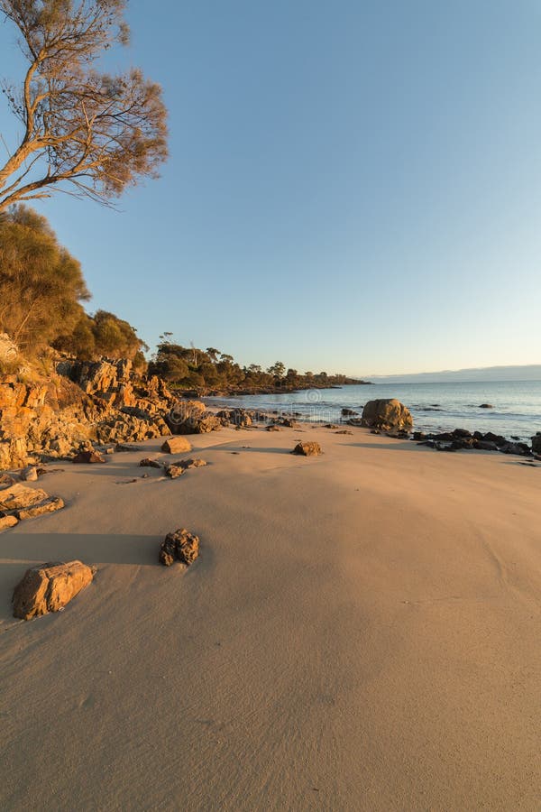 Beach and Rocks during the Sunset Stock Photo - Image of landscape ...