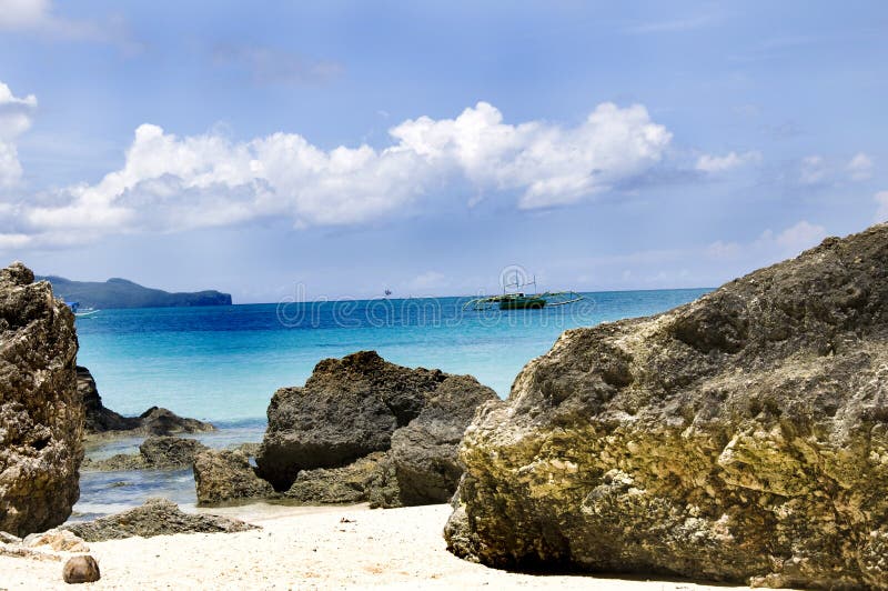 Beach with rocks in water stock image. Image of maritime - 57063581