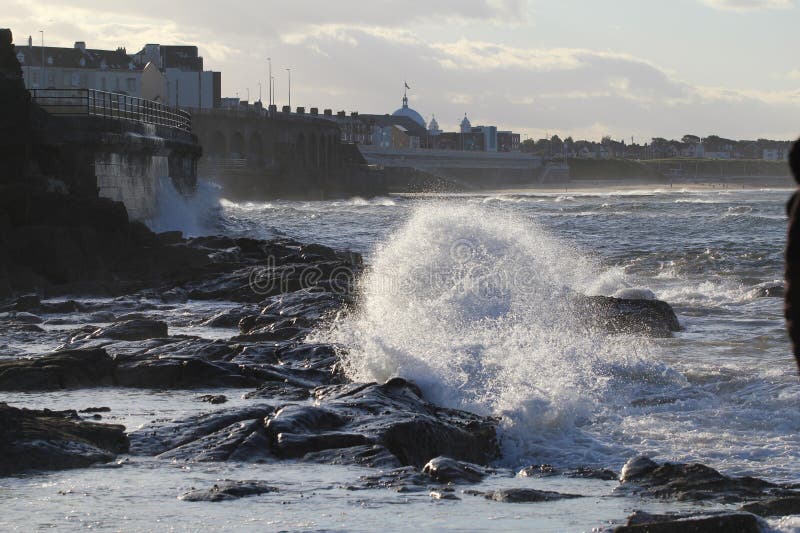 Beach with Rocks Water Breaking into Waves Stock Photo - Image of ...