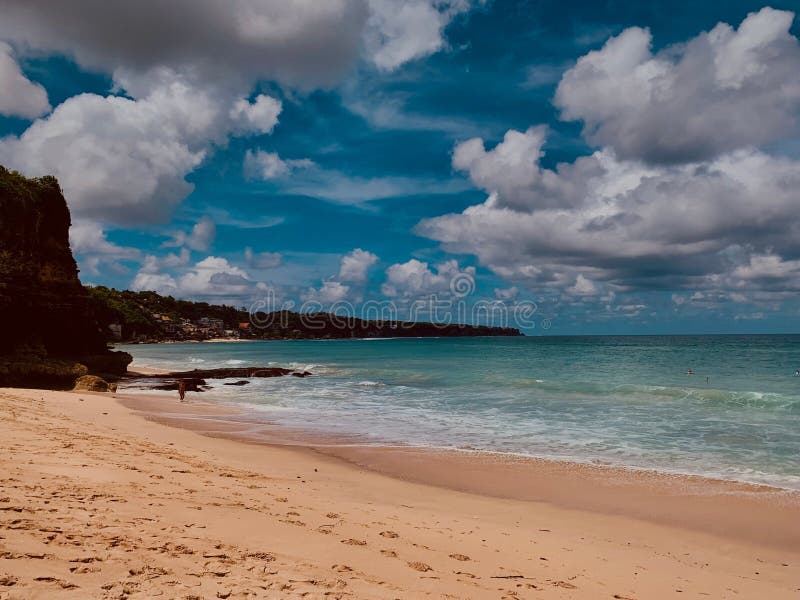 Beach with Rolling Waves Lapping Up Against the Shore Stock Image ...
