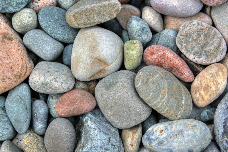 Beach Rounded Rocks in Various Colors from Ocean Stock Image - Image of ...