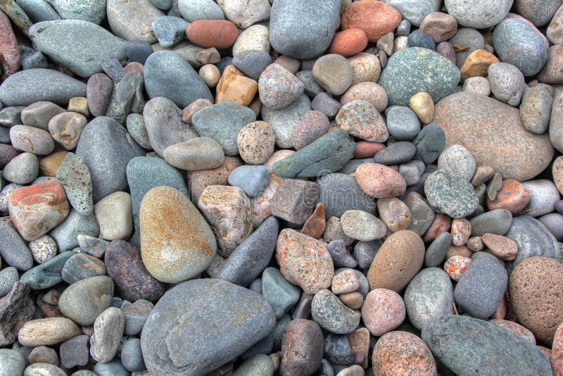 Beach Rounded Rocks in Various Colors from Ocean Stock Image - Image of ...
