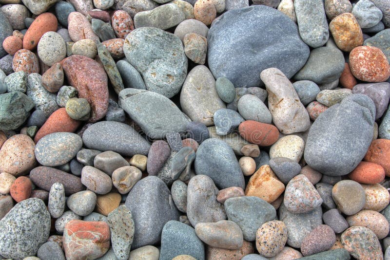 Beach Rounded Rocks in Various Colors from Ocean Stock Image - Image of ...