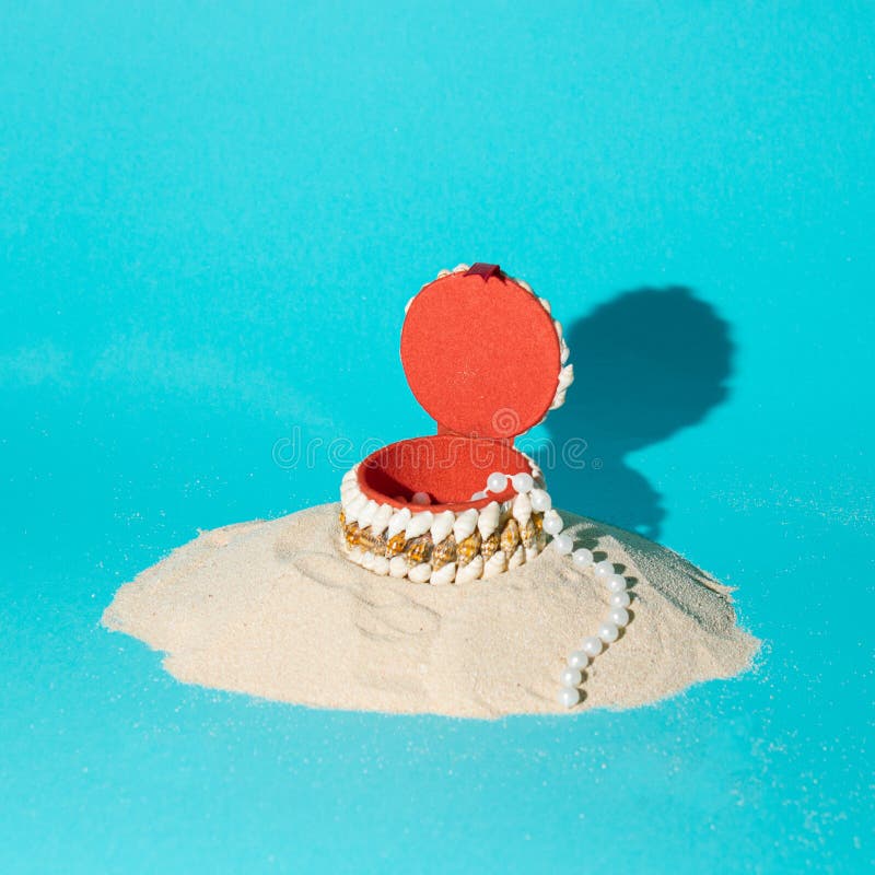 Beach Sand with a Box of Shells and with Pearls Coming Out of the Box ...