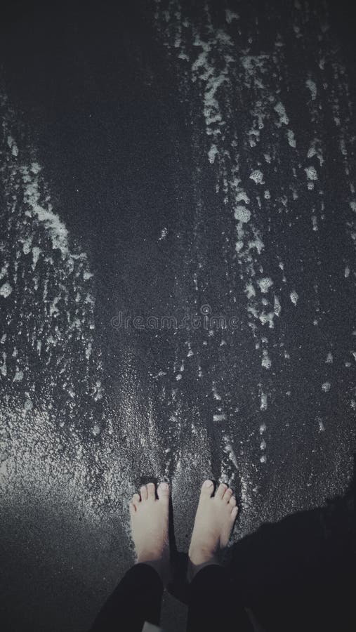 Beach with Sand and Feet Washed Up by the Beach Waves Stock Photo ...