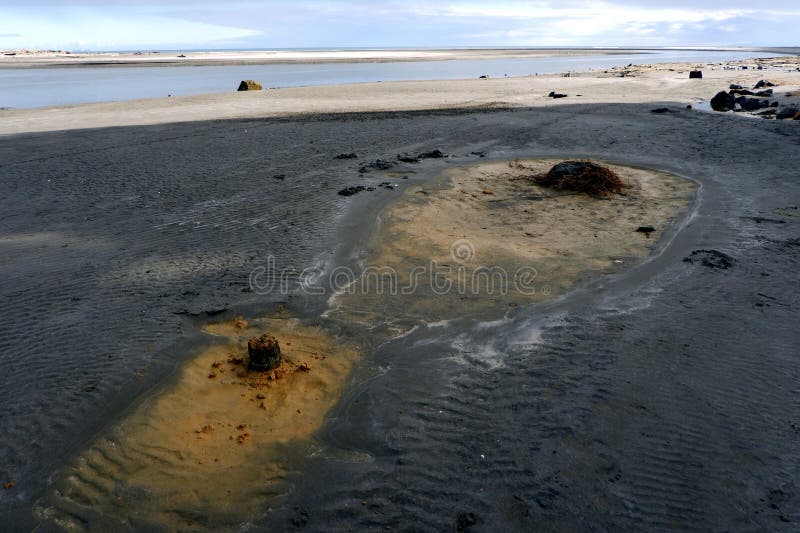 Beach Sand Rock Water Ocean Black Sand Beach Sky River Rippling Stock ...
