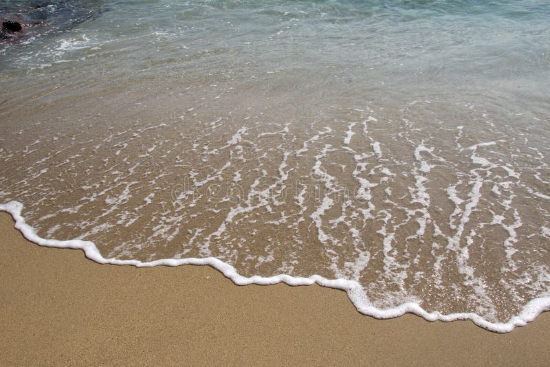 Beach sand and sea water stock photo. Image of spring - 45665000