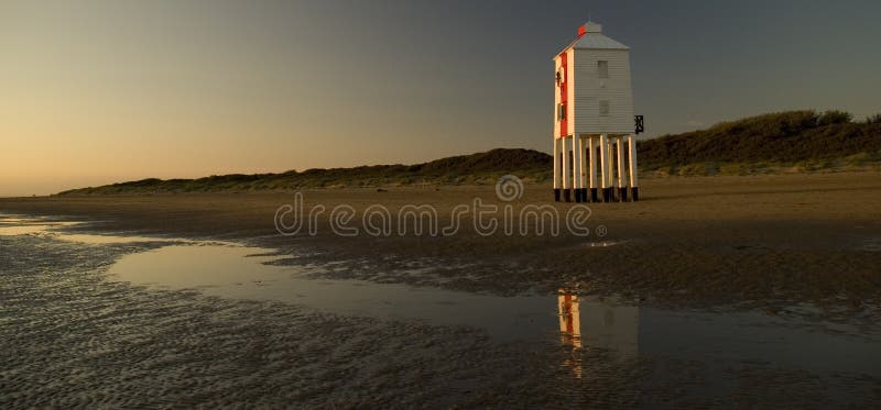 Beach Scene with Lighthouse Stock Image - Image of reflection ...