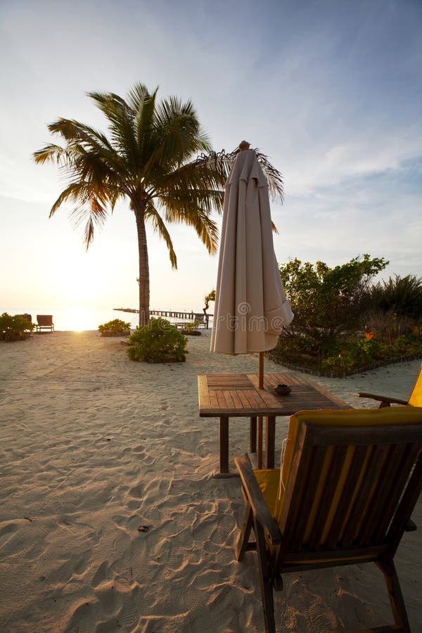 Beach scene stock image. Image of relaxation, chairs - 54158737