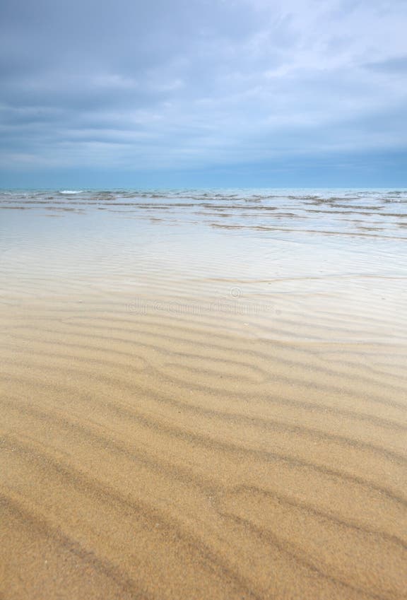 Beach Scene with Sand Ripples and Beautiful Sky Stock Image - Image of ...