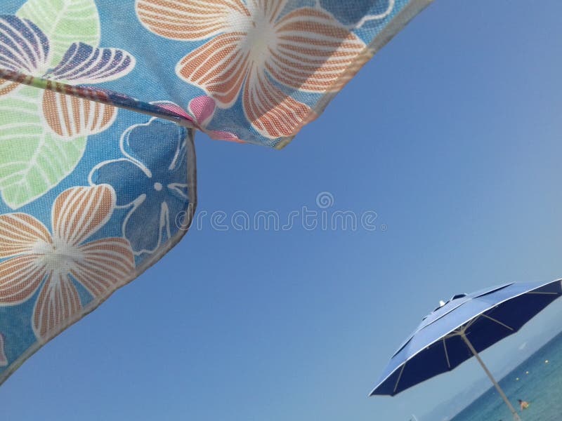 Umbrella with Floral Pattern Stock Photo - Image of beach, scenery ...